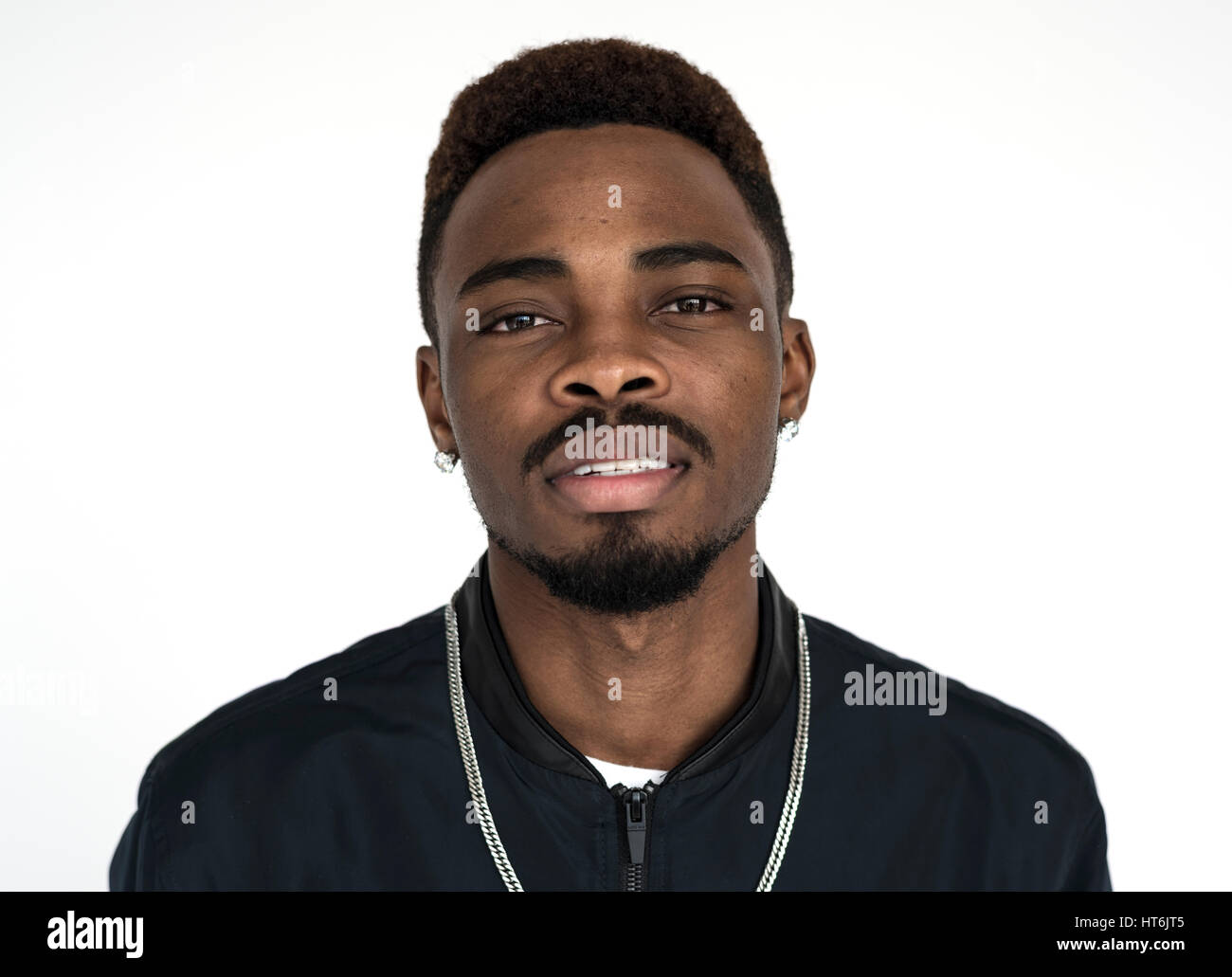 Young black guy with a straight face portrait Stock Photo - Alamy