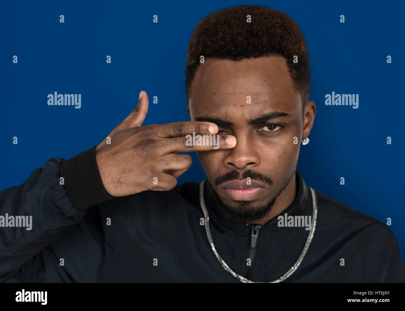African Descent Man Serious Hand Gesture Stock Photo - Alamy