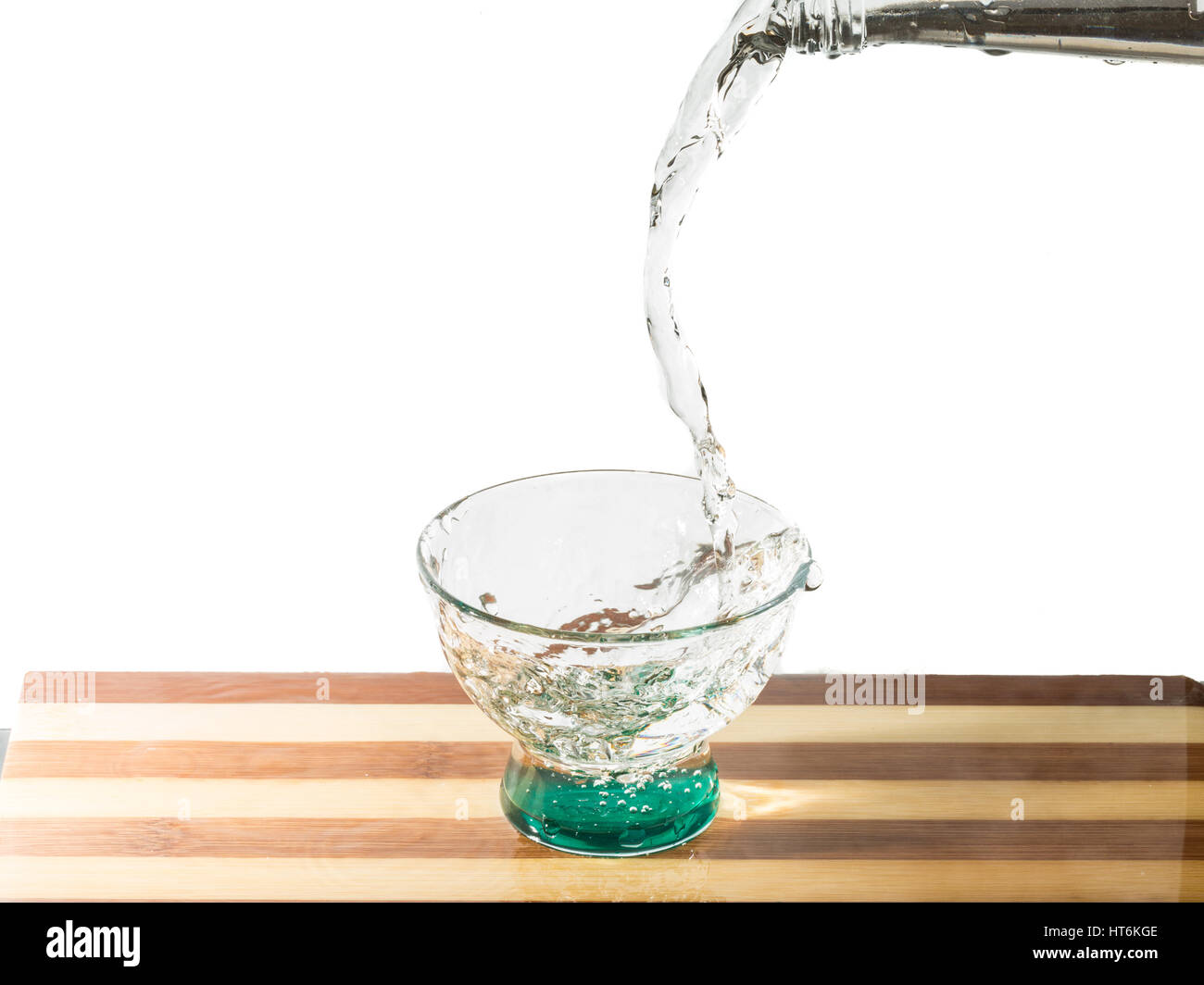 Pure water splashing from bottle hi-res stock photography and images ...