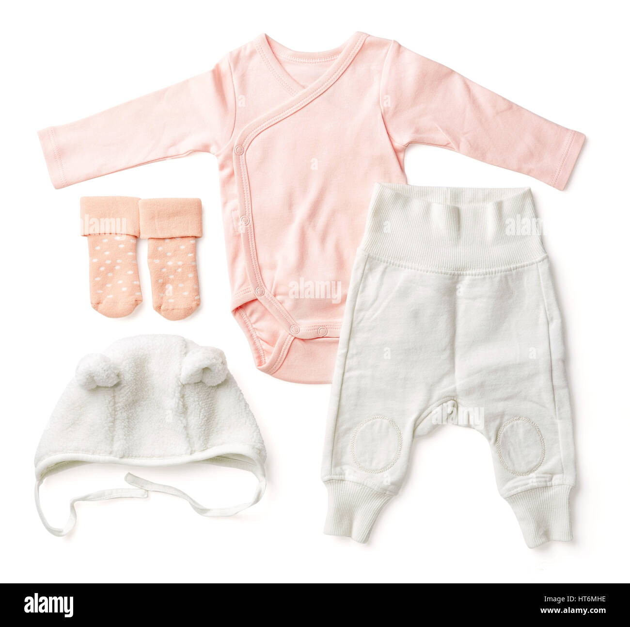 Set of pink baby clothes on white background, top view Stock Photo - Alamy
