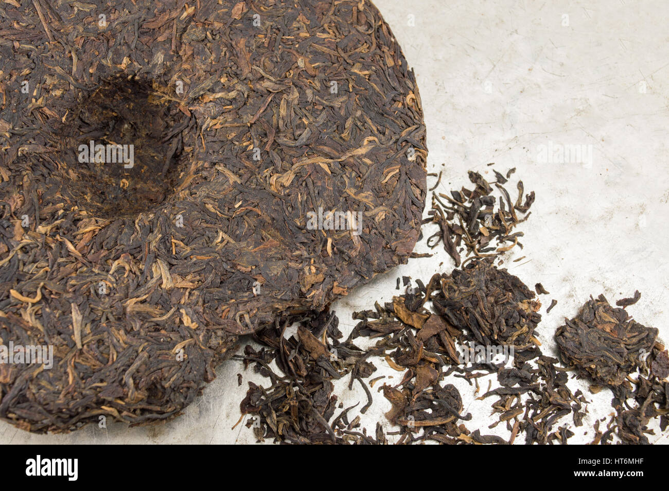 Pu-erh fermented Chinese tea in a roll Stock Photo - Alamy
