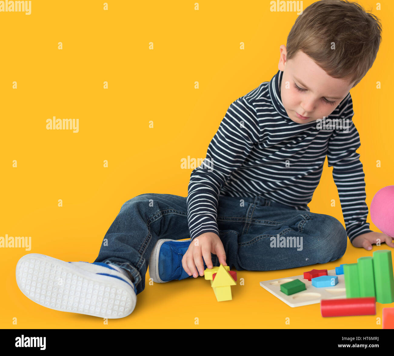 Caucasian Boy Focused Concentrated Play Stock Photo - Alamy
