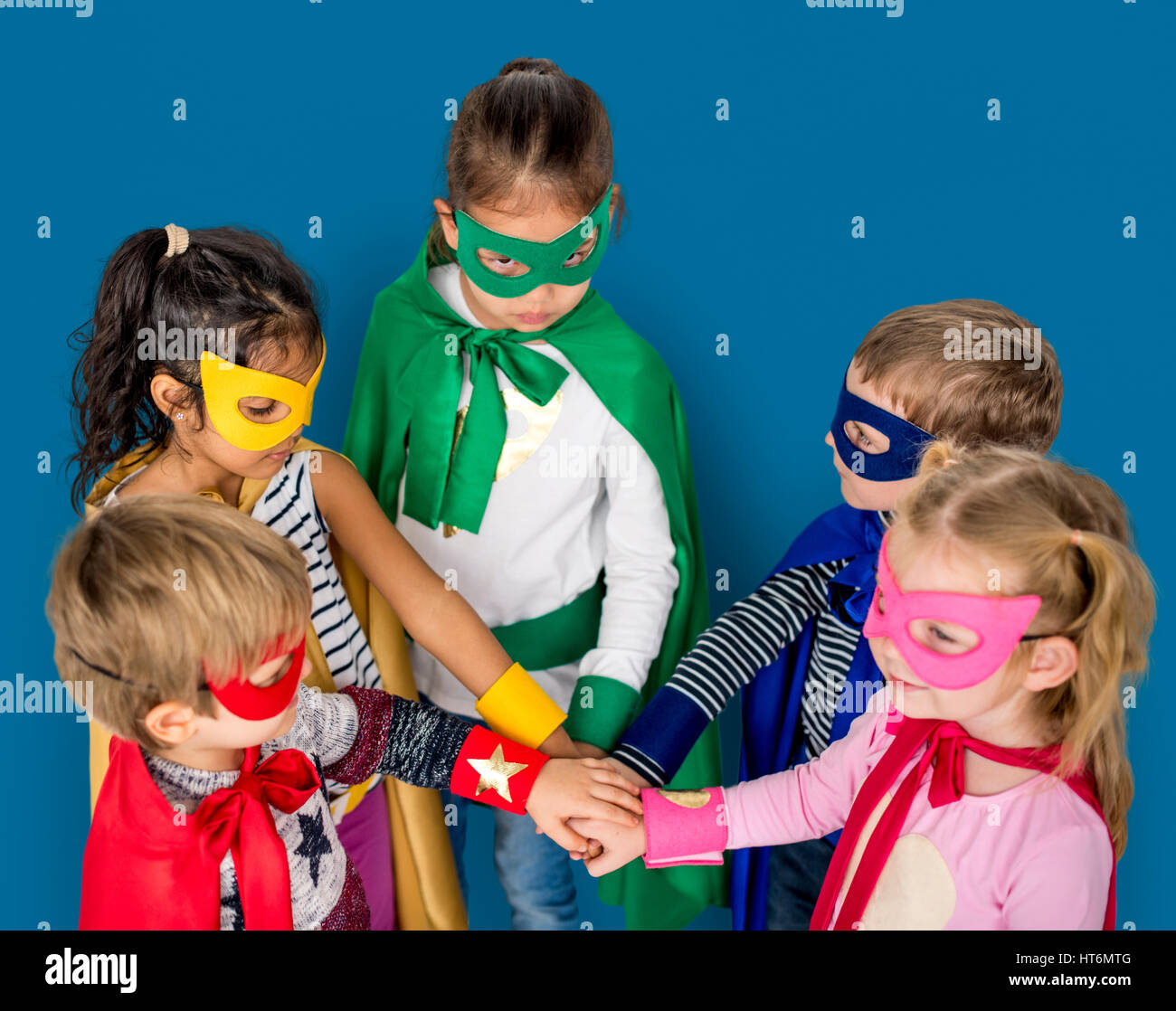 Little Kids Superhero Hands Together Teamwork Stock Photo - Alamy