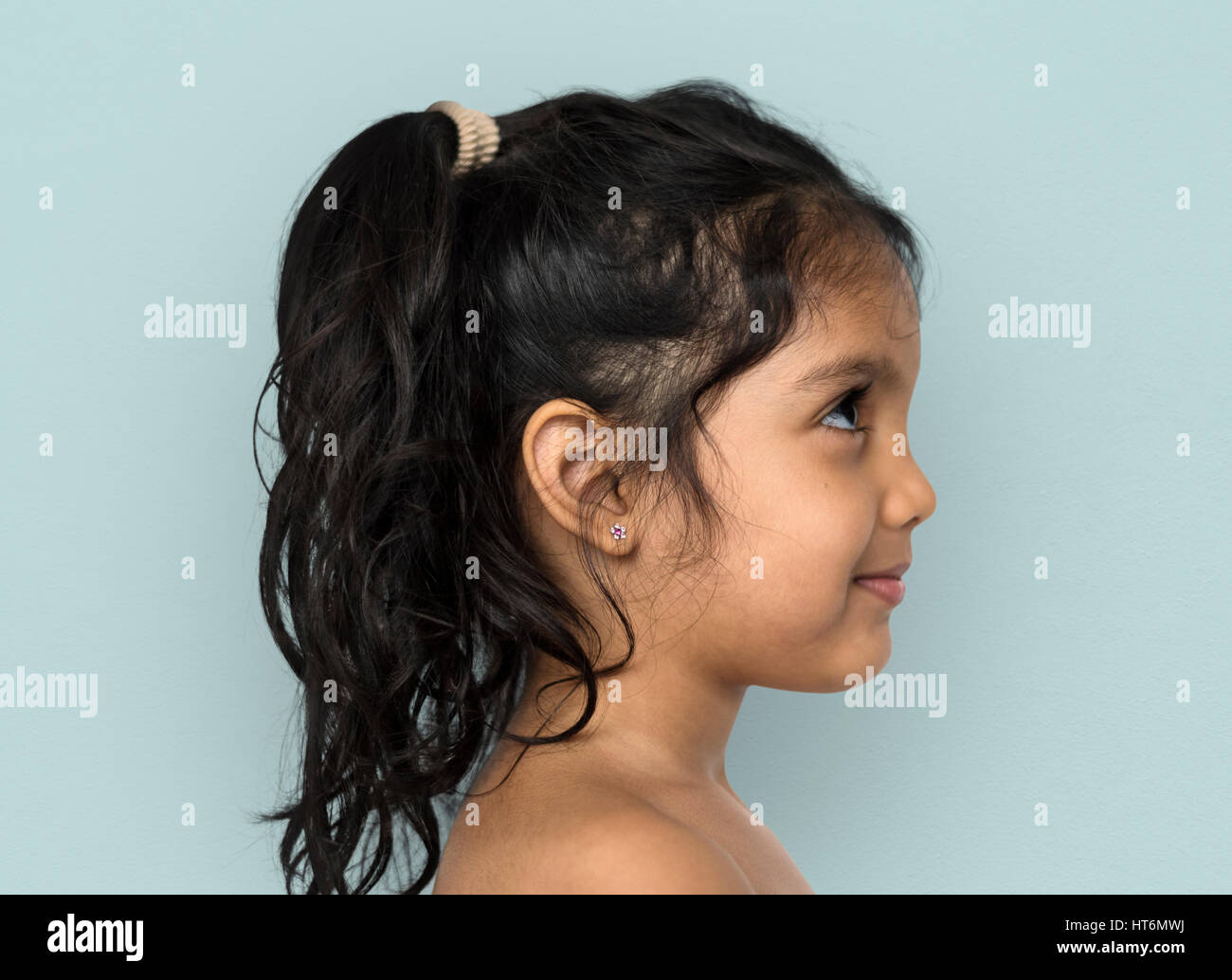 Asian Little Girl Smiling Side View Stock Photo - Alamy