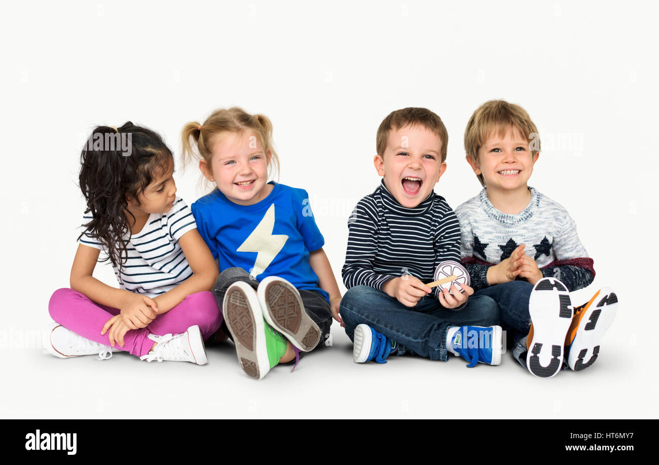 Little Children Holding Down Happy Cheerful Stock Photo - Alamy