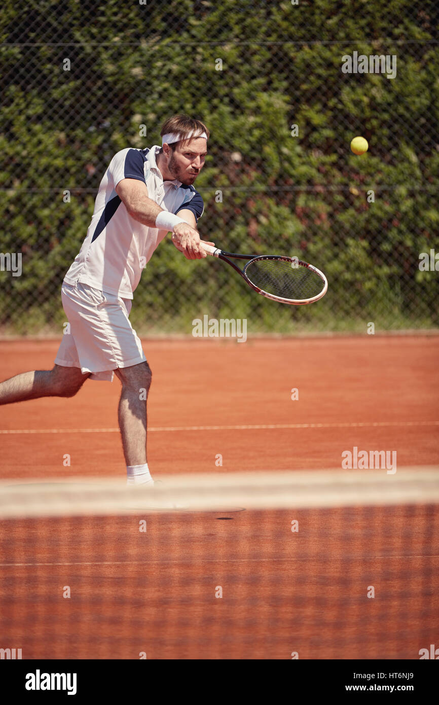 Tennis player serving ball hi-res stock photography and images - Alamy