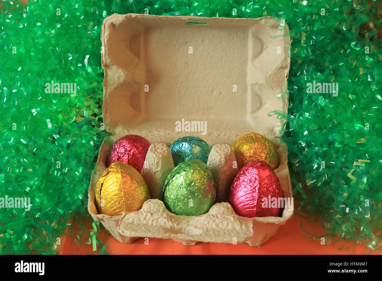 An image showing the concept of Easter with a box of colorful eggs ...