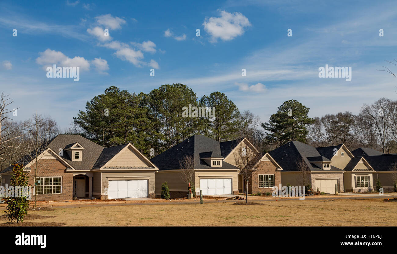 Three New Home Construction Stock Photo - Alamy