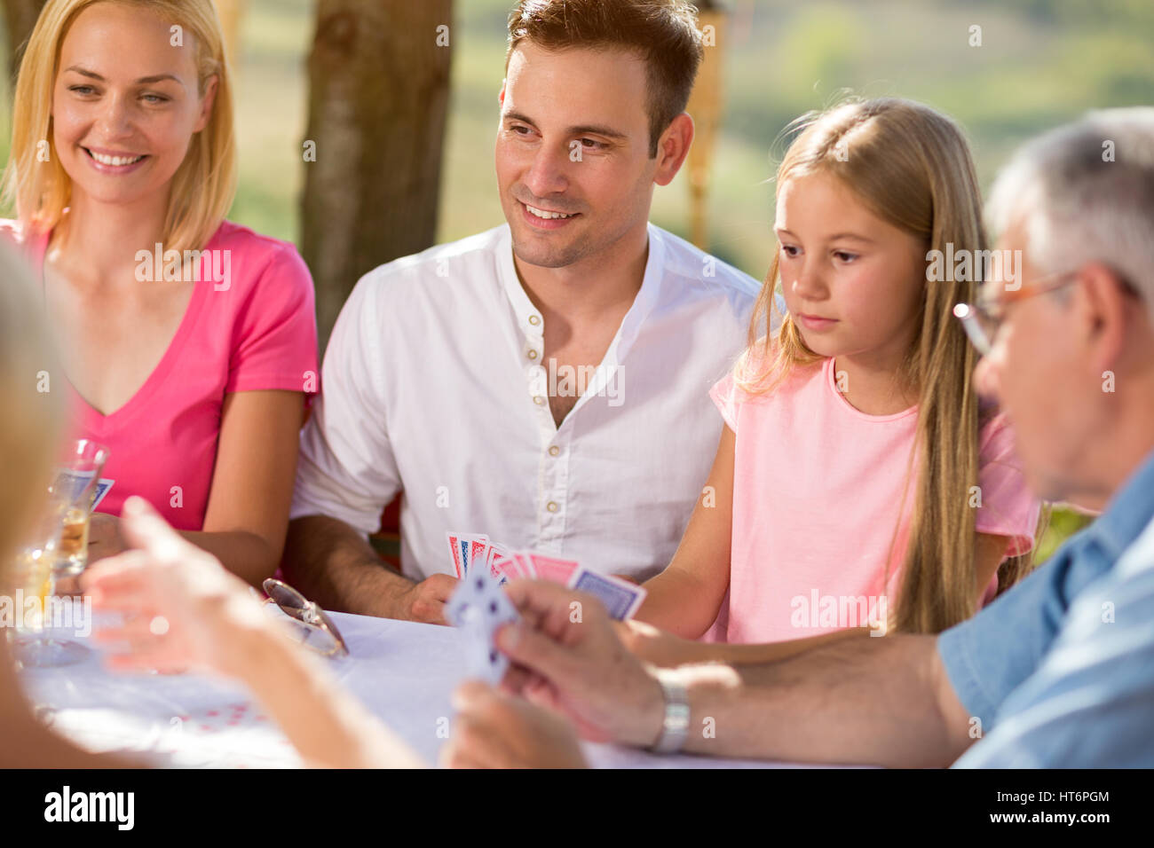 Family playing cards hi-res stock photography and images - Alamy