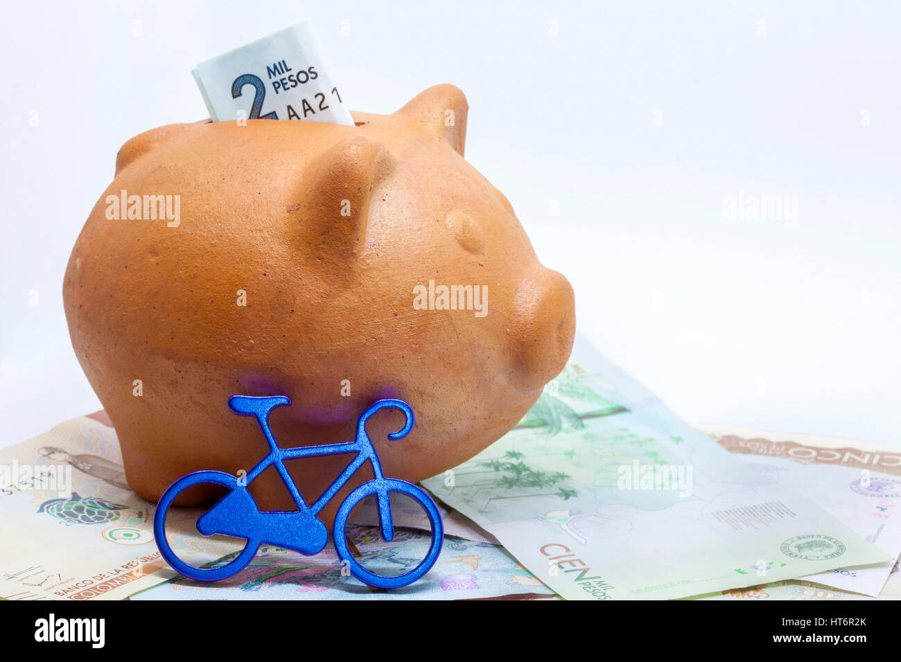 Save money using your bicycle Stock Photo - Alamy