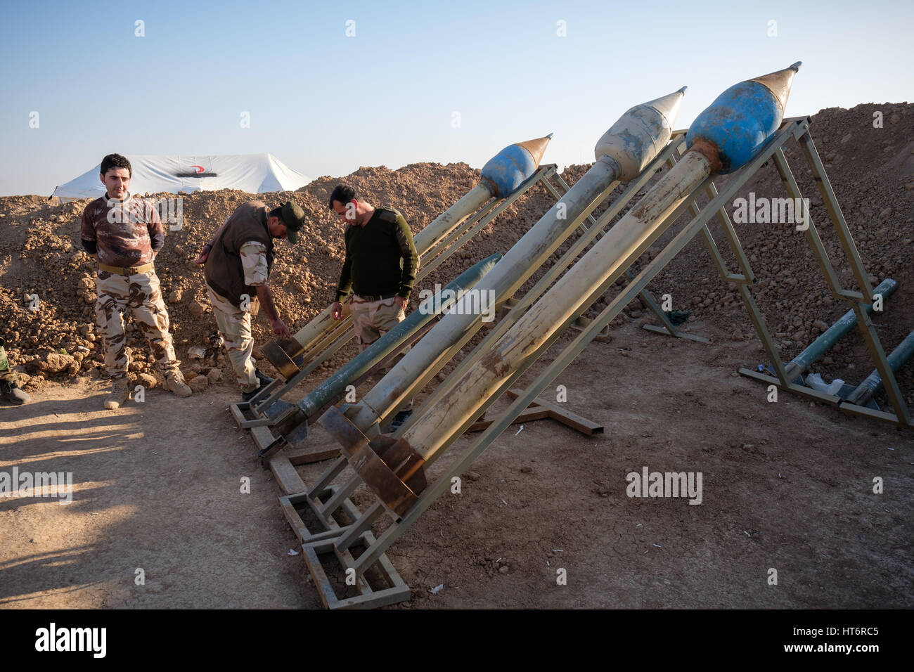 Kudish Peshmerga fighters with captured ISIS home made rockets on the ...