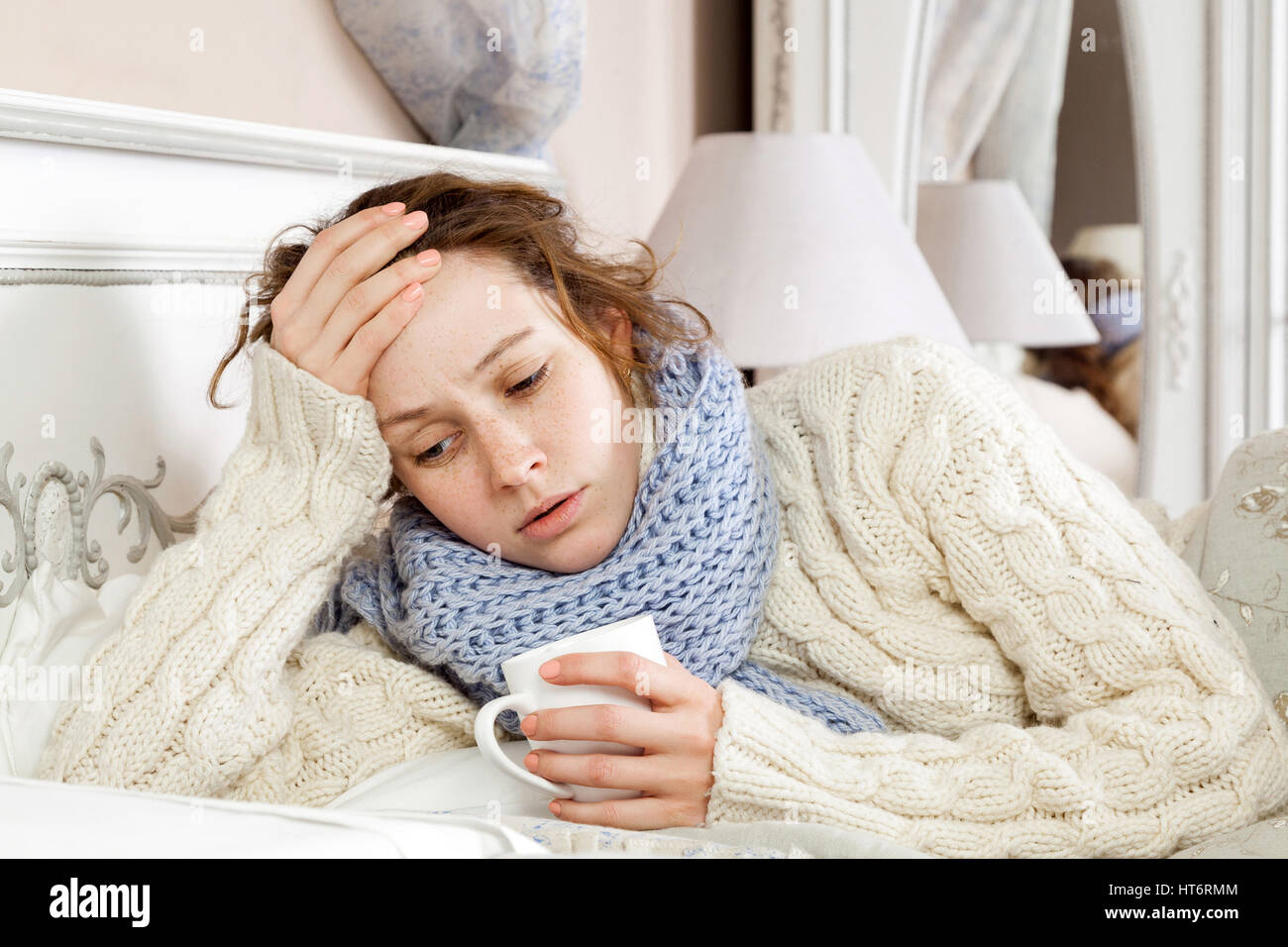 Sick woman with cup of tea. Closeup image of young frustrated sick ...