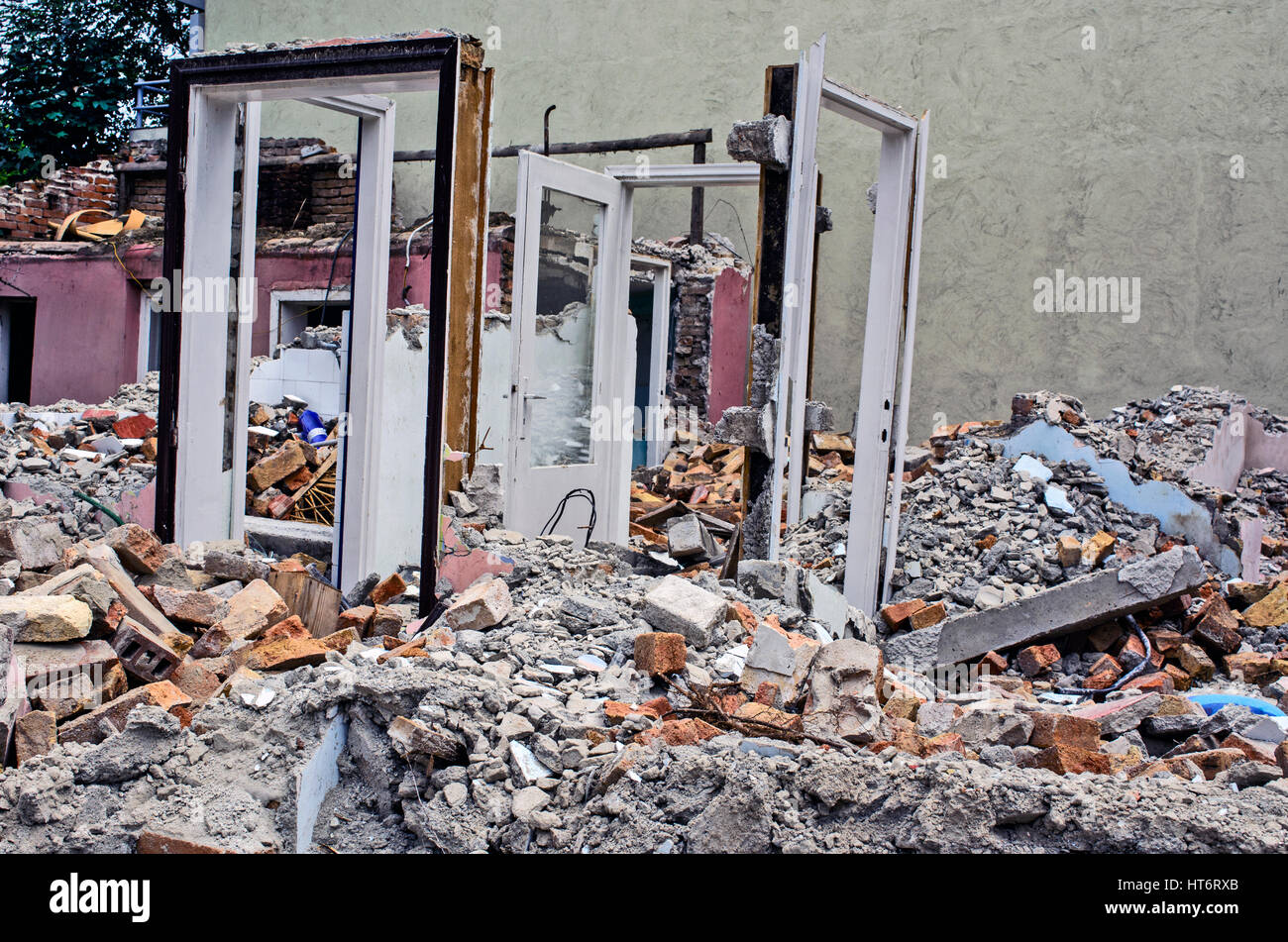 Old house in ruins to build new building Stock Photo - Alamy