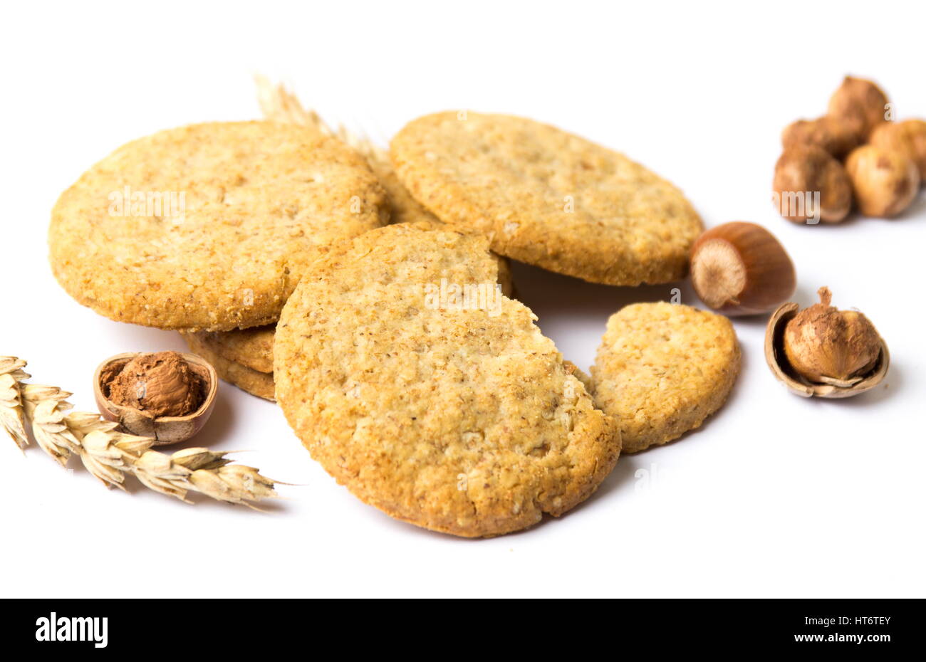 Integral cookies with hazelnuts and linseed on white background Stock ...