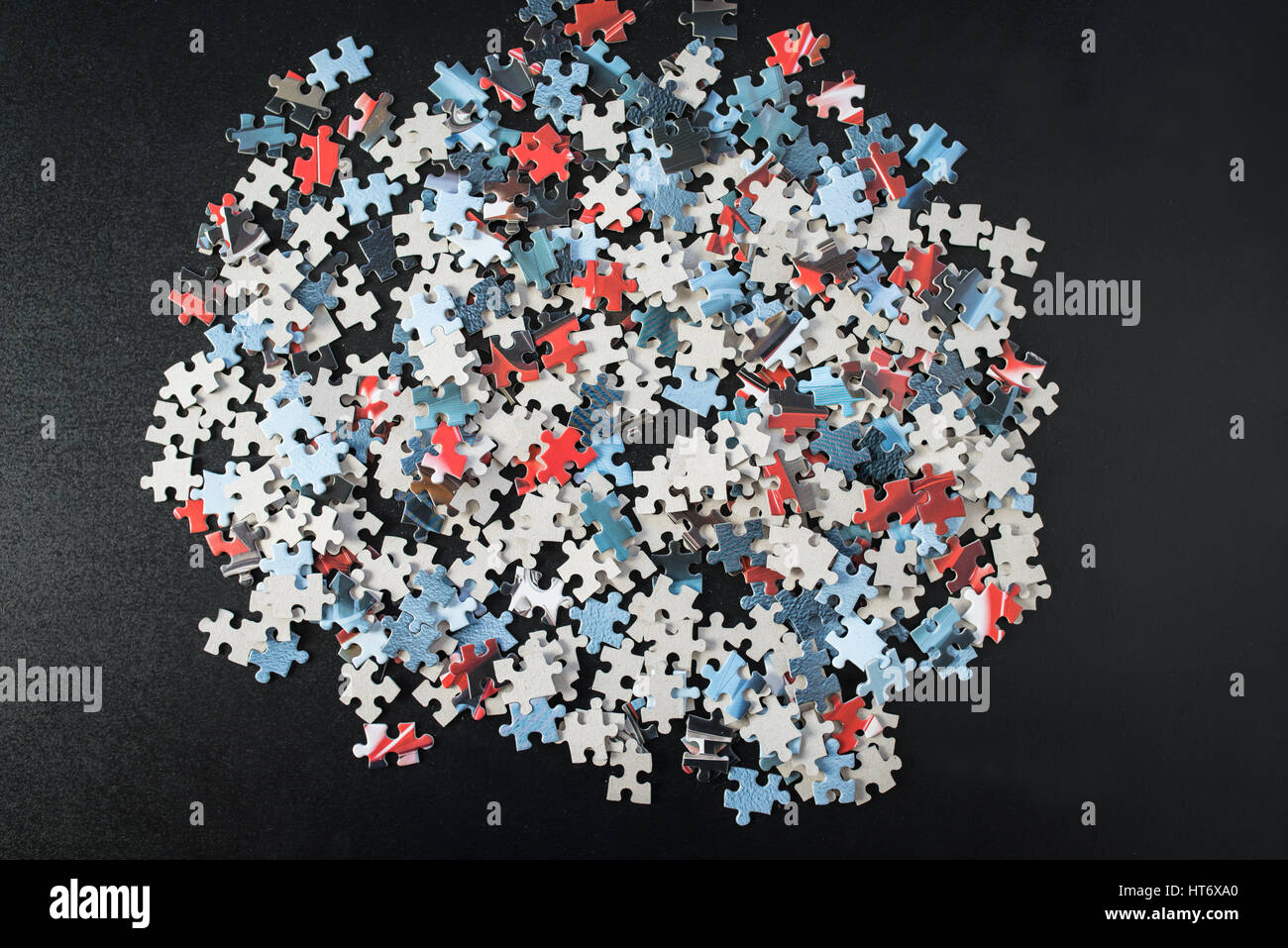Pile of jigsaw puzzle pieces hi-res stock photography and images - Alamy