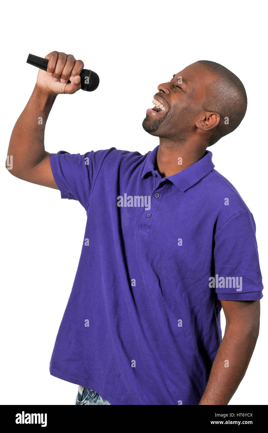 Handsome man singer performing at a concert Stock Photo - Alamy