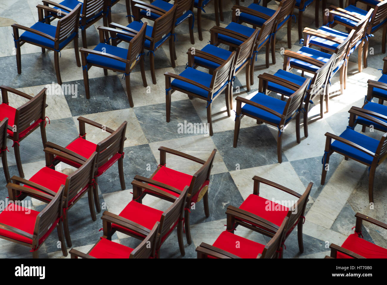 Red and blue chairs from top view and chequered floor Stock Photo - Alamy
