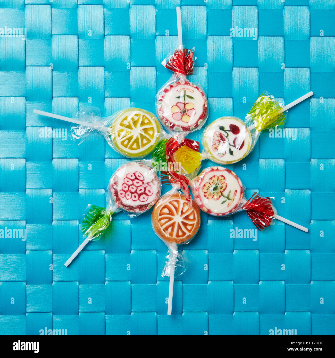 Many colorful lollipops in a circle from above Stock Photo - Alamy