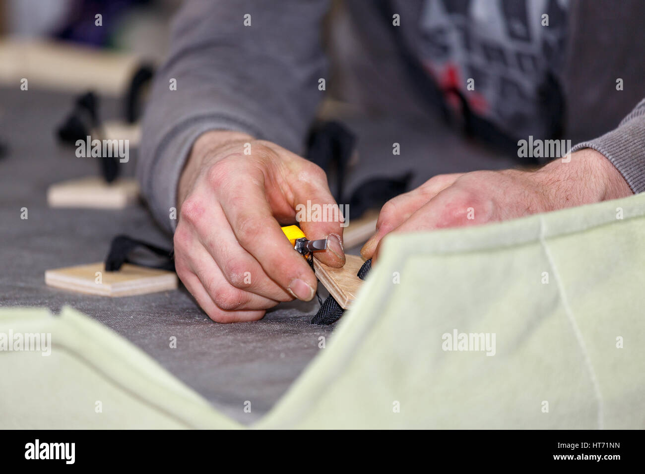 Hand of a man who works with wood products Stock Photo - Alamy