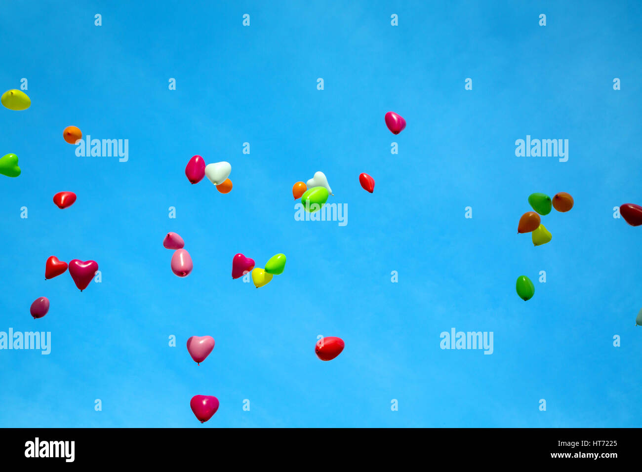 Flying Color Balloons in the Sky in a Summer Day Stock Photo - Alamy