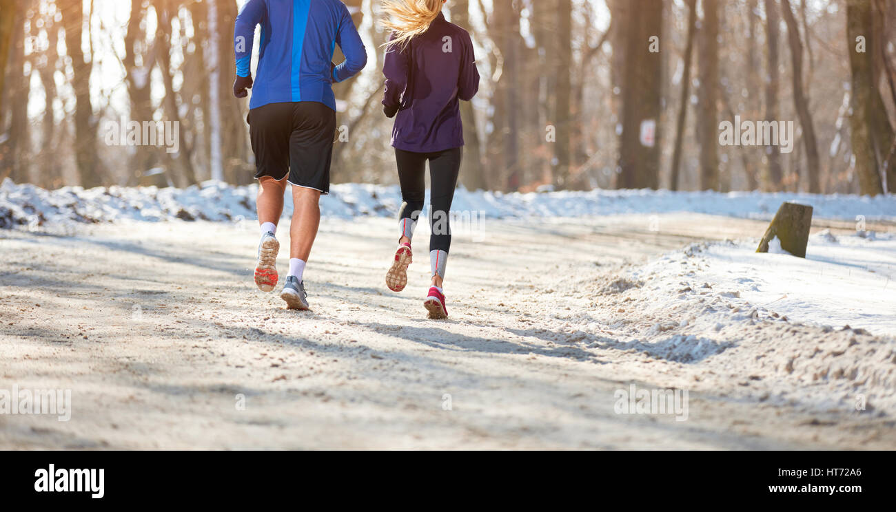 Back view running young hi-res stock photography and images - Alamy