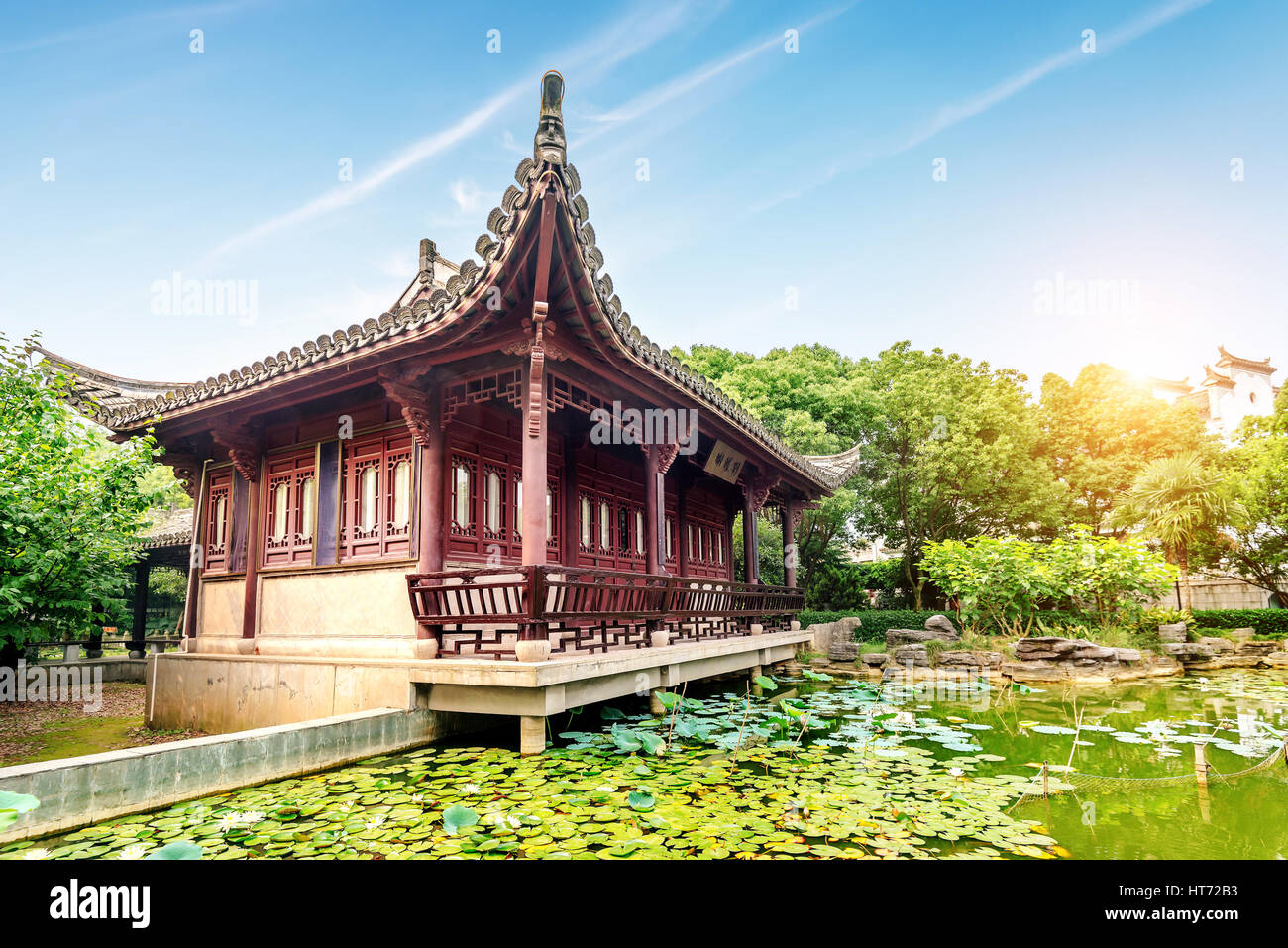 Traditional Chinese ancient buildings, a pond and duckweed Stock Photo ...