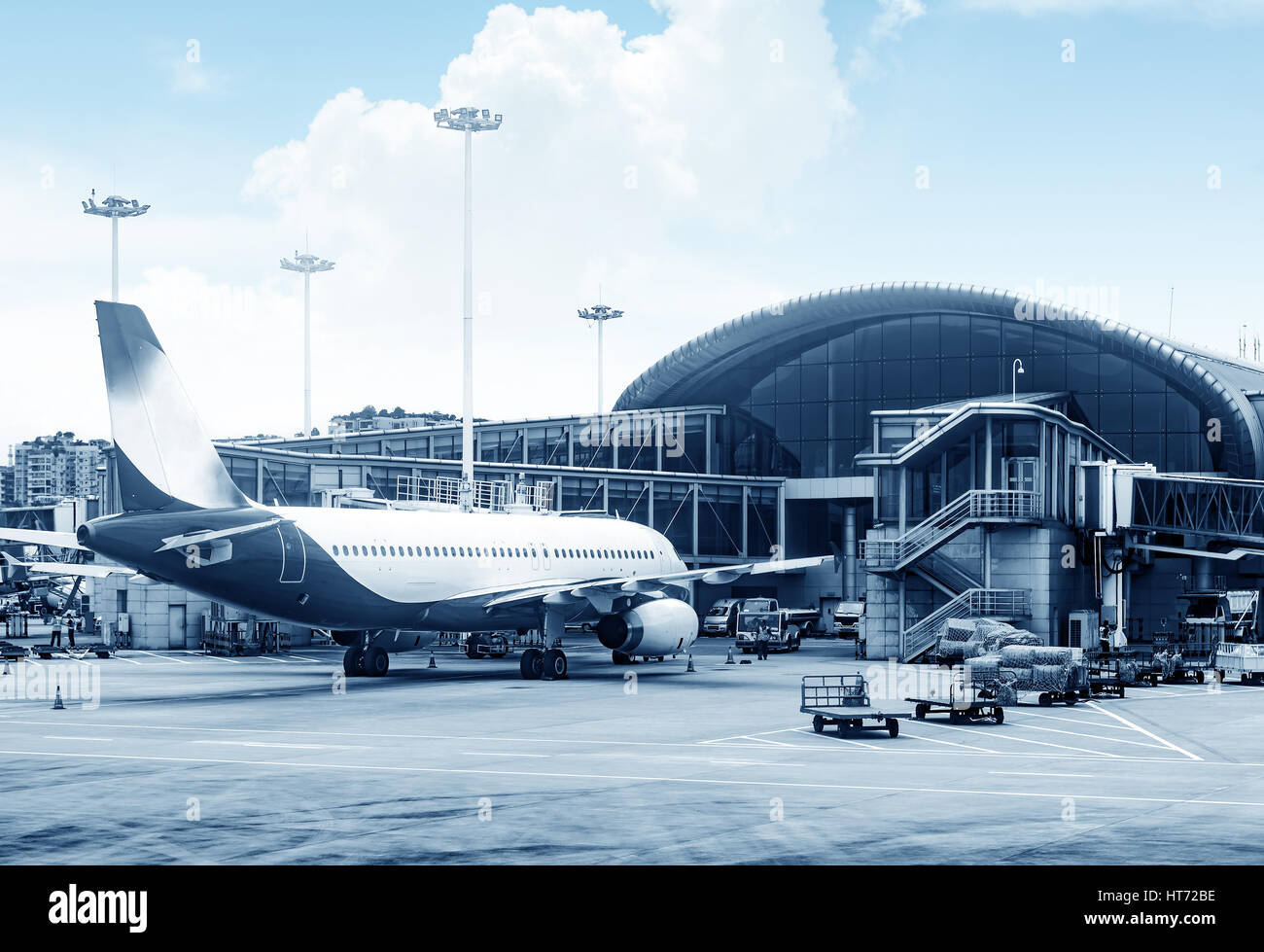 Large passenger terminal and airport Stock Photo - Alamy