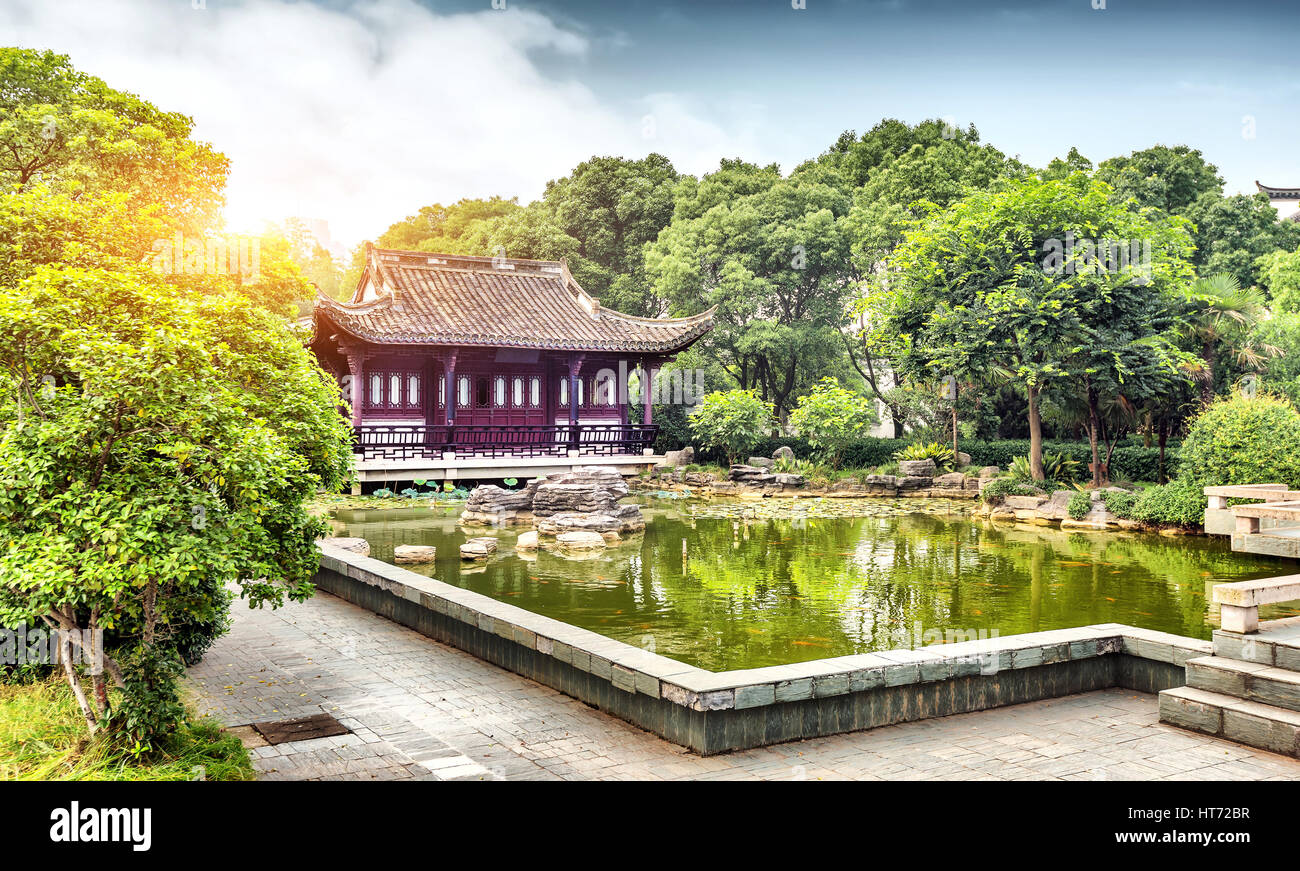Traditional Chinese ancient buildings, a pond and duckweed Stock Photo ...