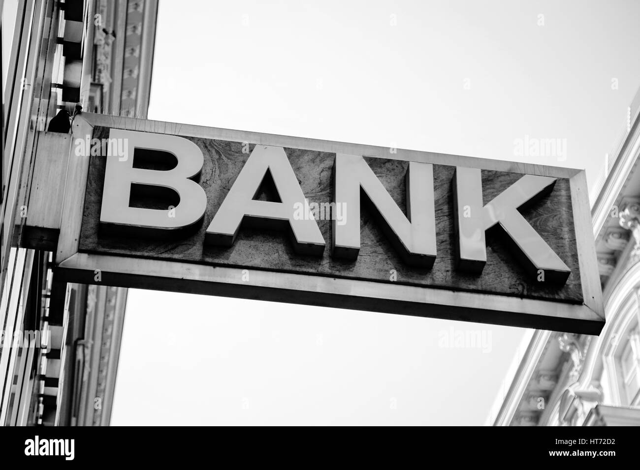 Old 'Bank' sign on a building exterior Stock Photo - Alamy