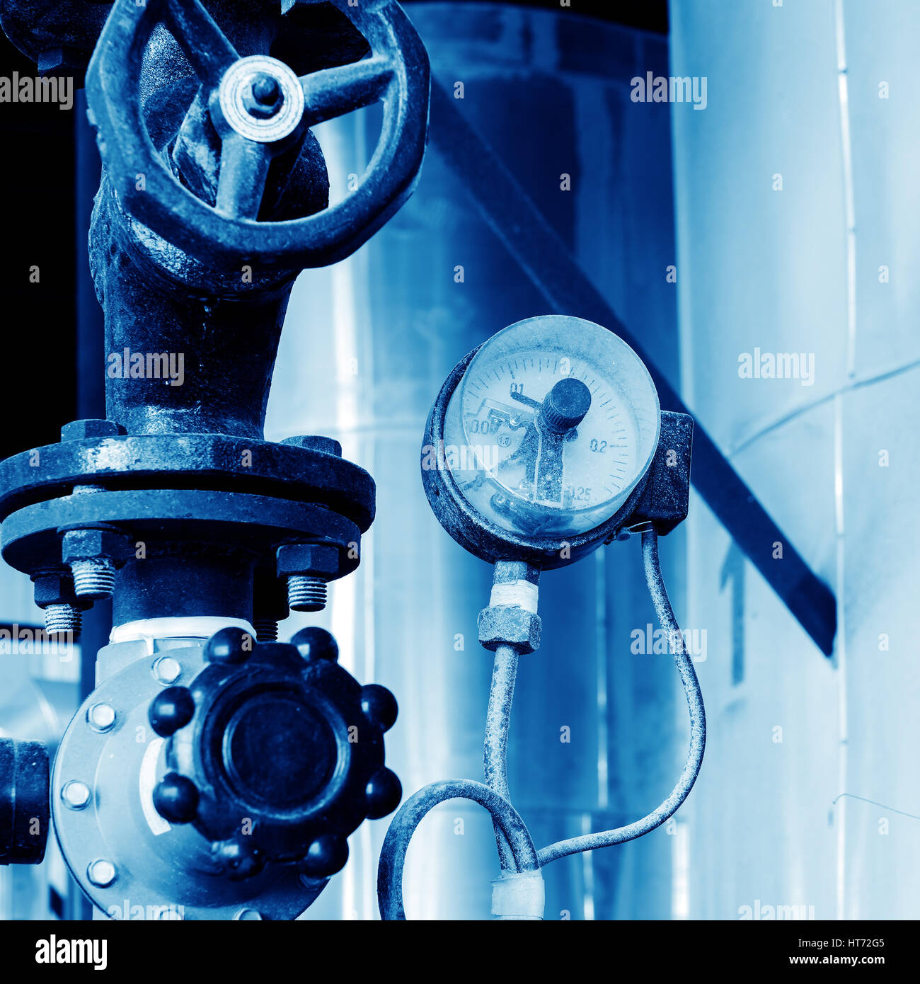 On the factory floor of a pressure gauge and valve Stock Photo - Alamy