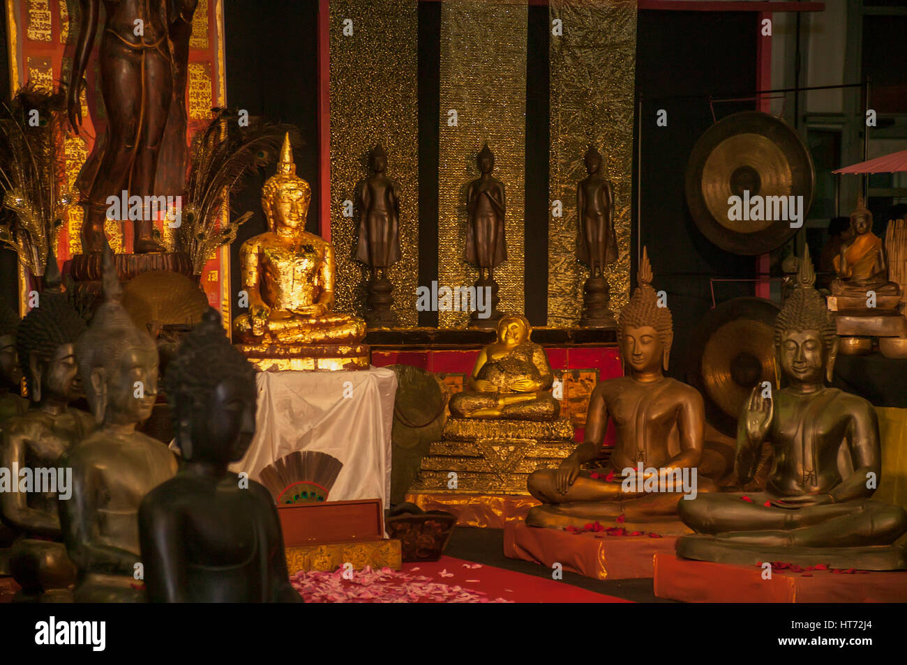 Oriental culture: Set of statues of Buddha and many other symbols of ...