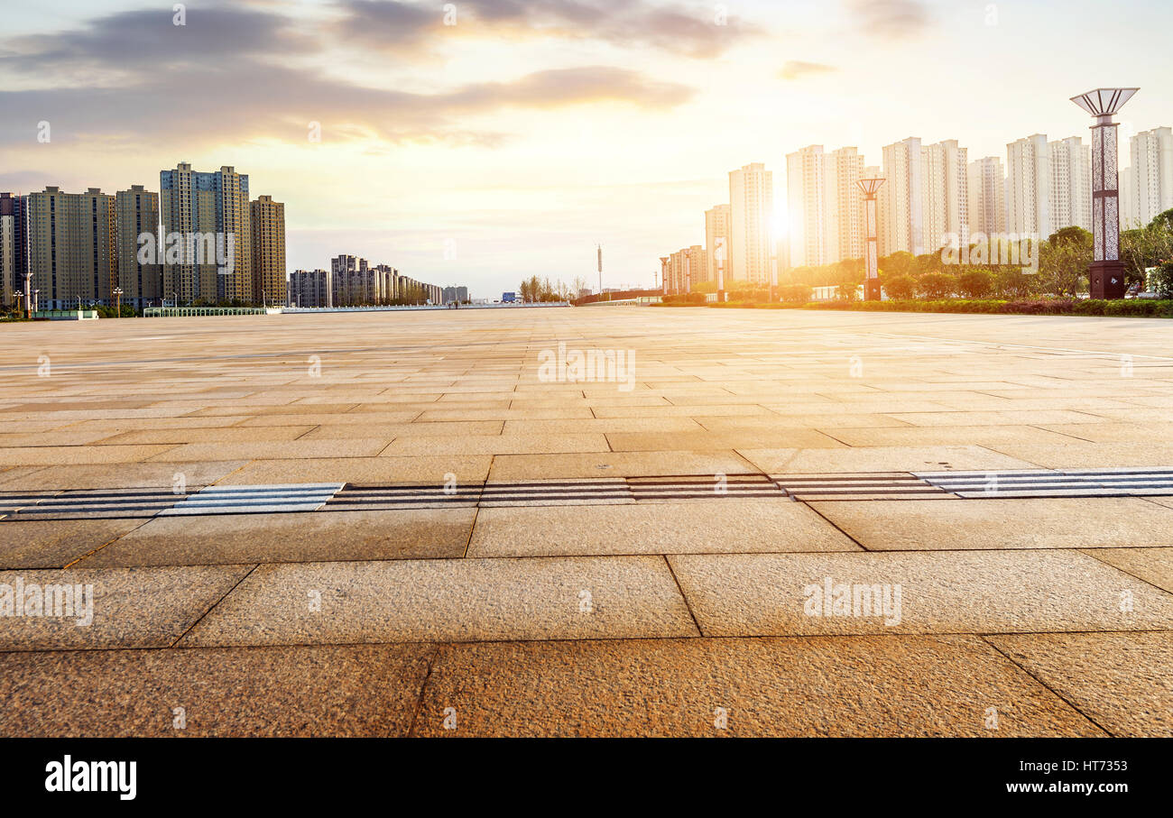 Empty floor and modern building with sunbeam Stock Photo - Alamy