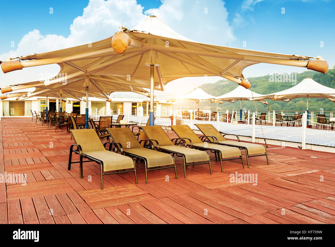 Cruise ship deck, morning sun shines on the floor, a piece of red Stock ...