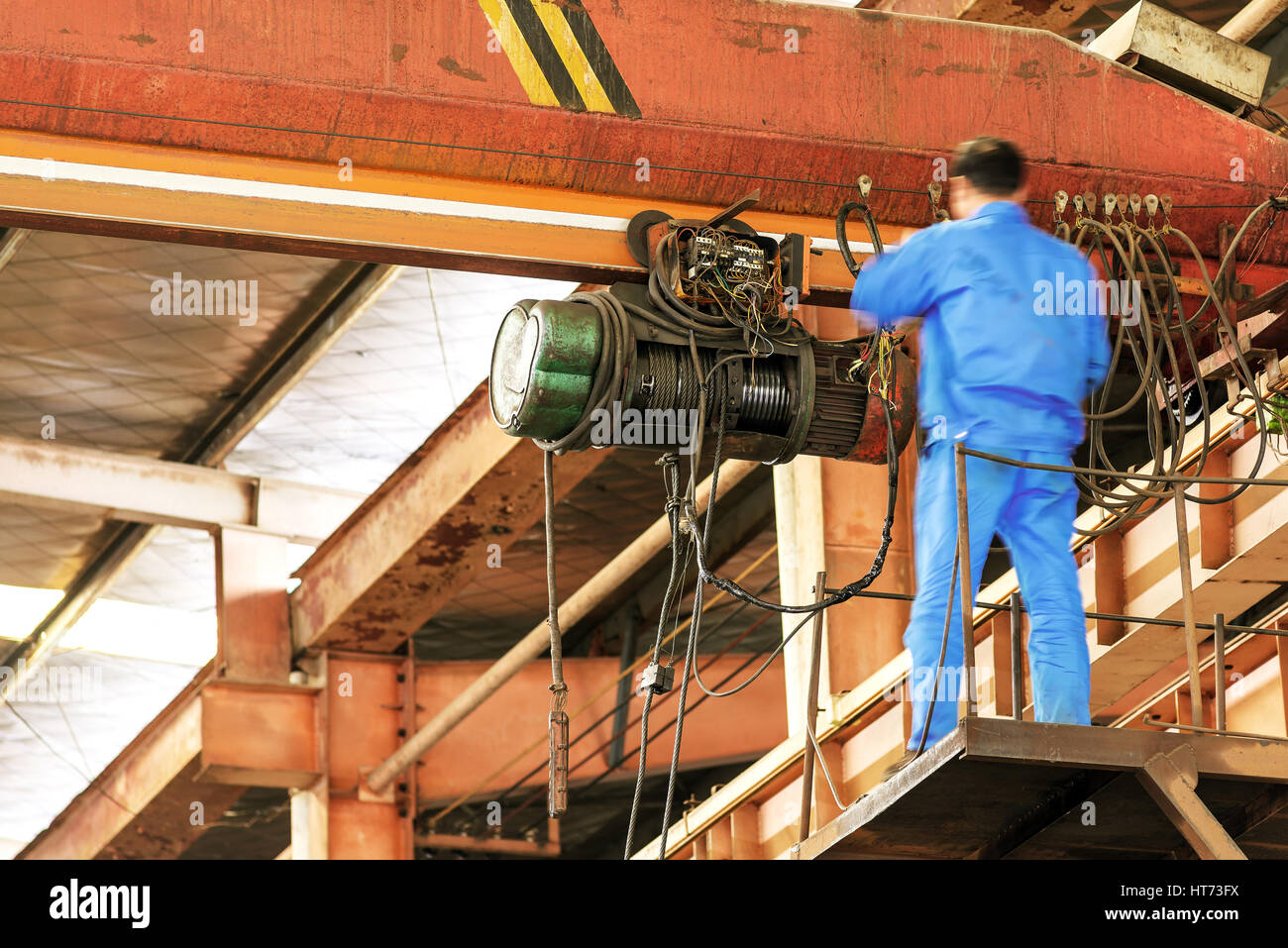 Engineers in the maintenance of overhead cranes Stock Photo - Alamy