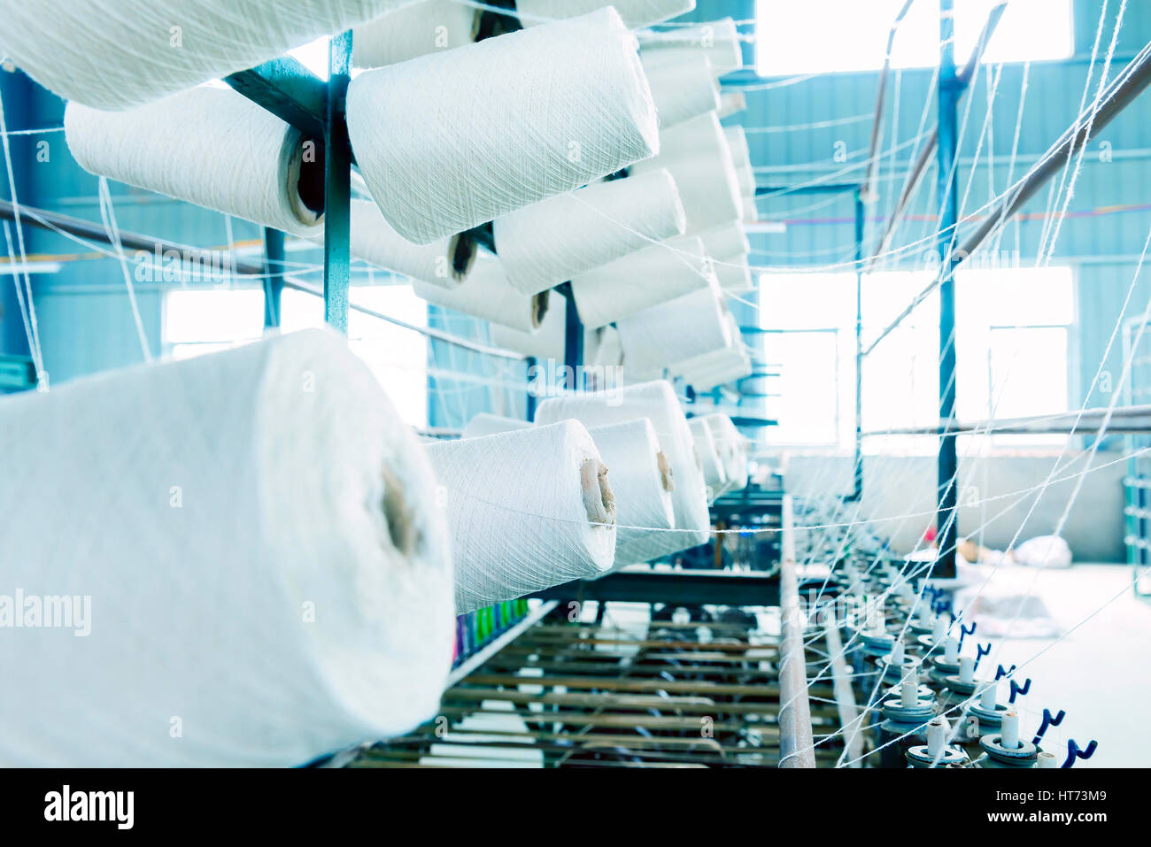 Factory on manufacture of threads Stock Photo - Alamy