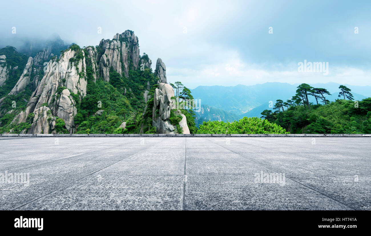 Mist-shrouded mountains, geological wonders Stock Photo - Alamy