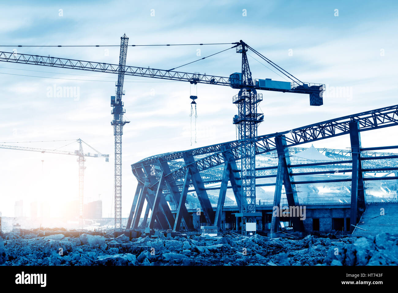 Construction sites, cranes and huge steel structure Stock Photo - Alamy