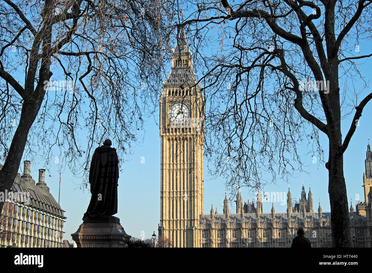 View of Big Ben clock tower and statue of Benjamin Disraeli in ...