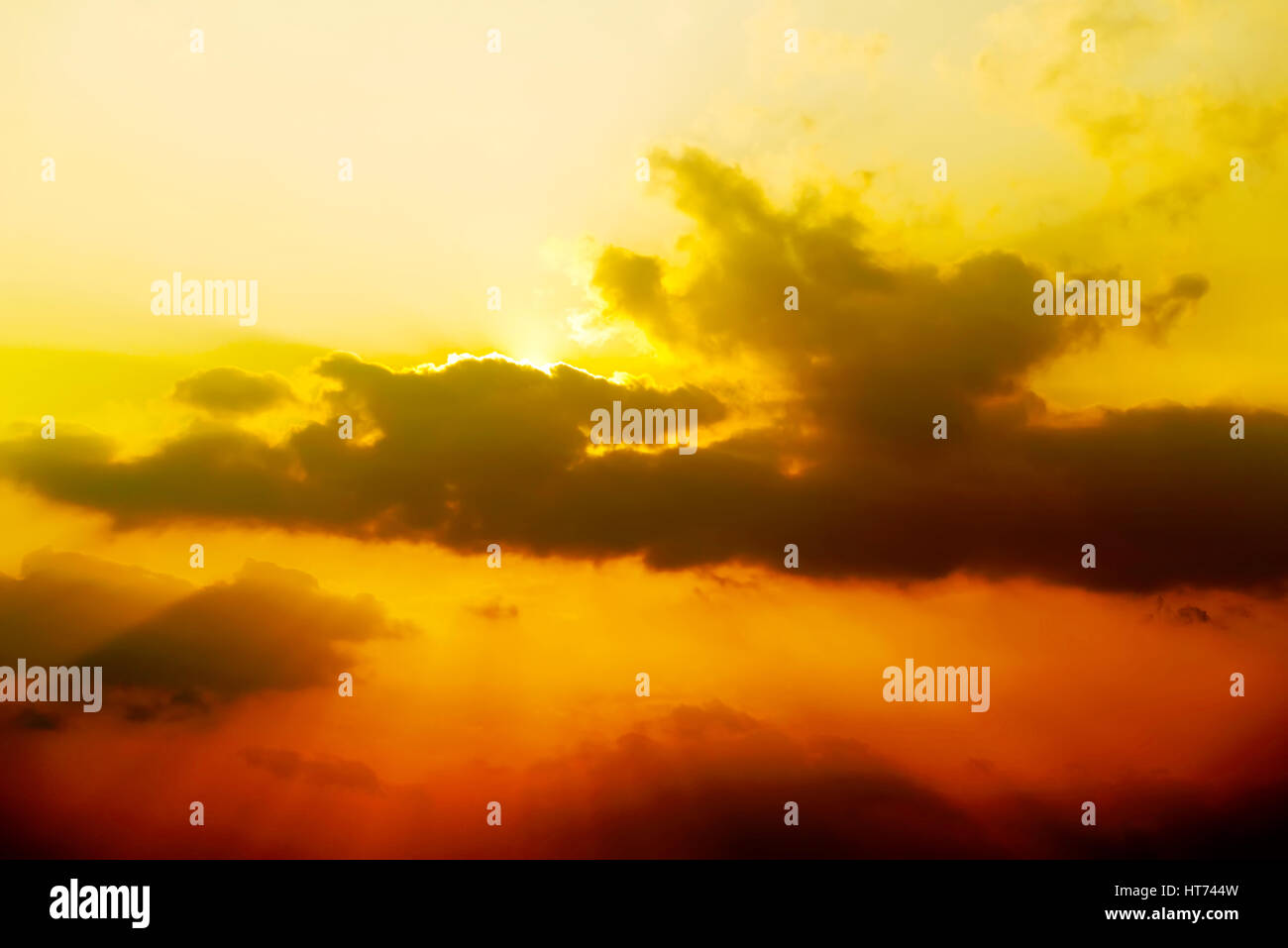 Sunset / sunrise with clouds, light rays and other atmospheric effect ...