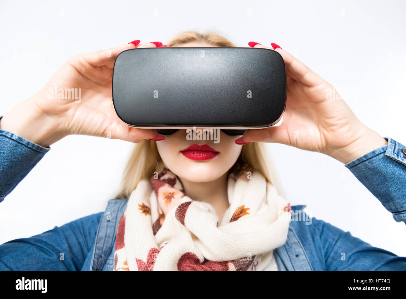 Attractive woman wearing virtual reality goggles. VR headset. Virtual ...