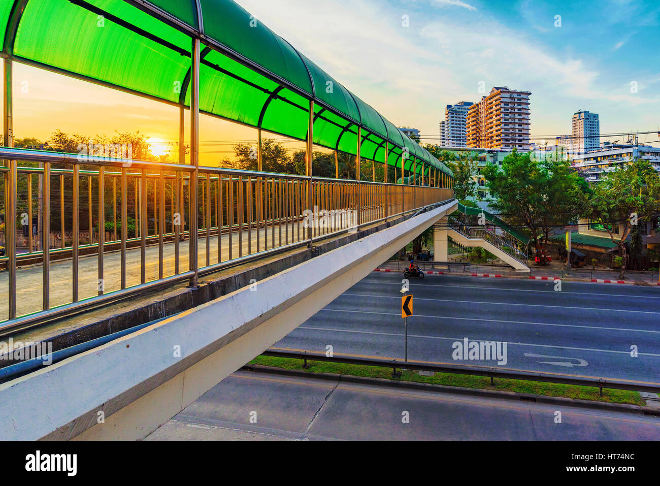 View of overpass walkway with sunset in downtown Bangkok Stock Photo ...