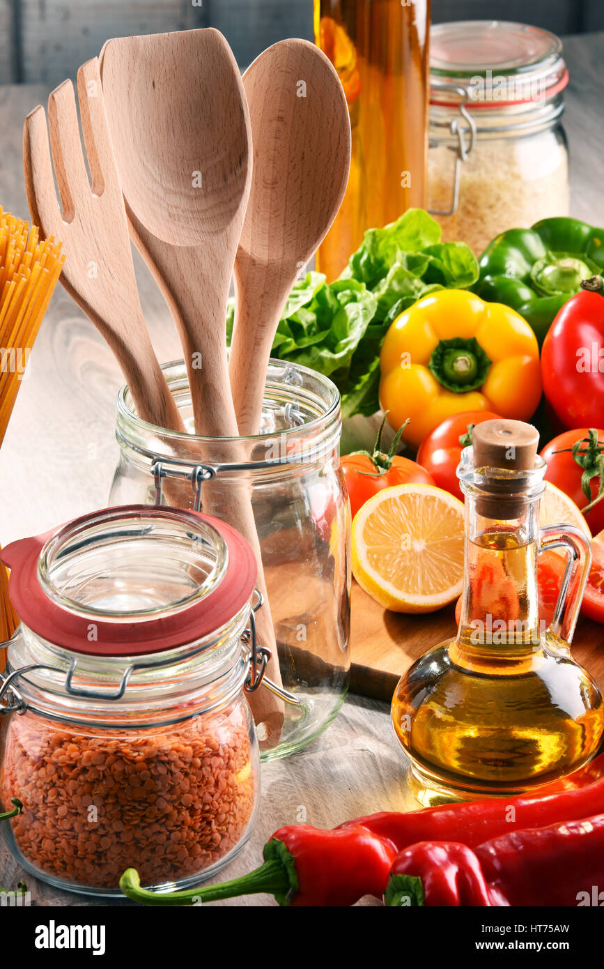 Composition with assorted food products and kitchen utensils on the ...