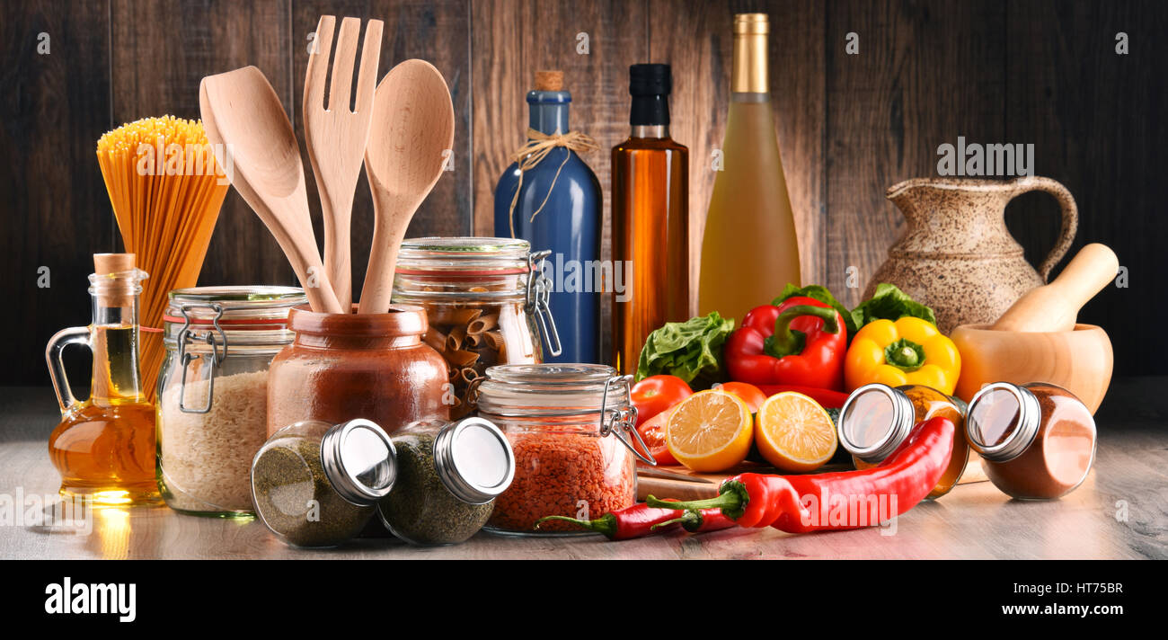 Composition with assorted food products and kitchen utensils on the ...