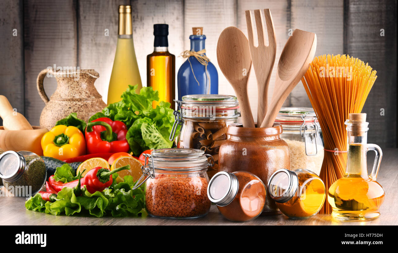 Composition with assorted food products and kitchen utensils on the ...