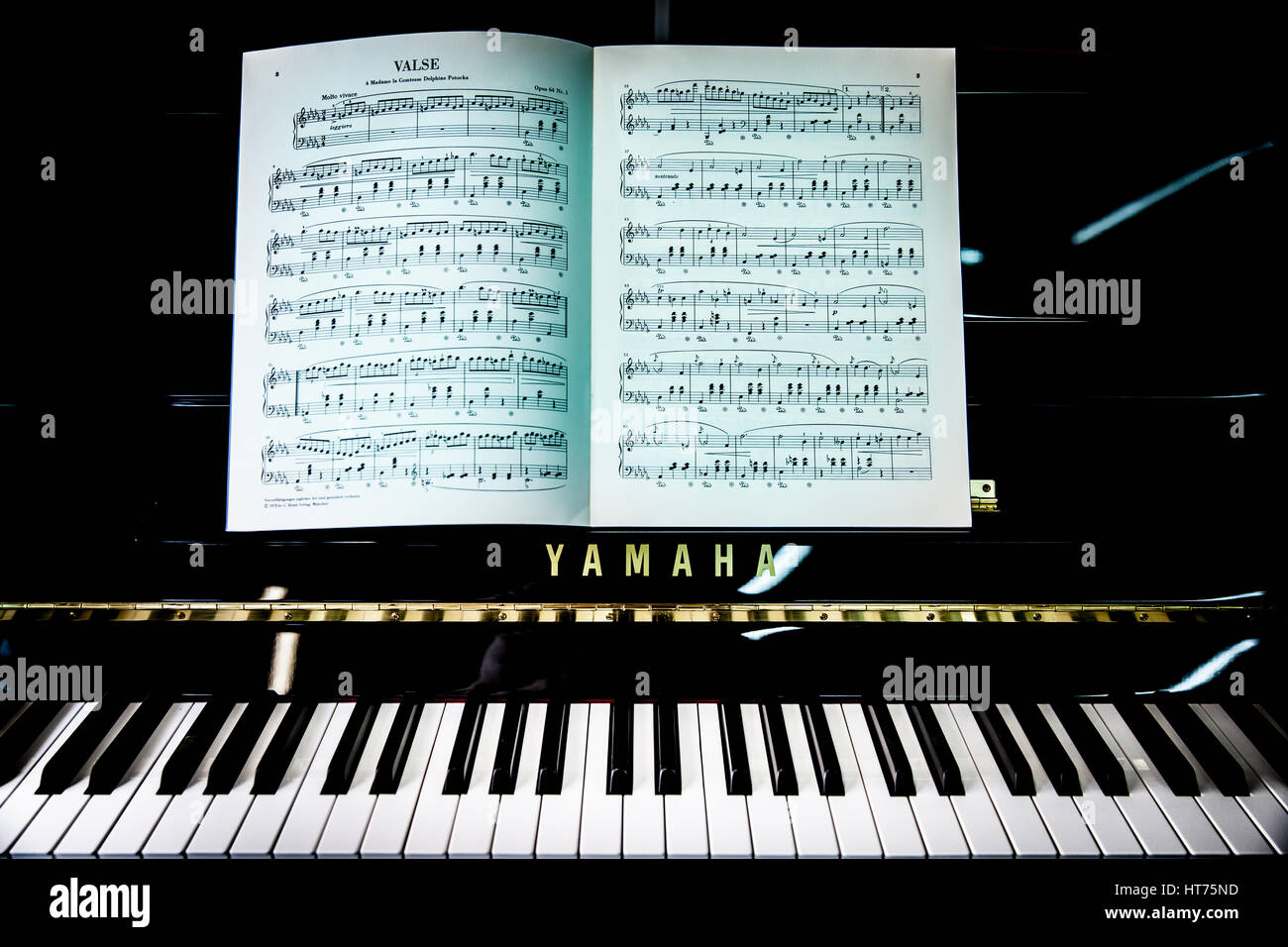 upright piano with a score Stock Photo - Alamy