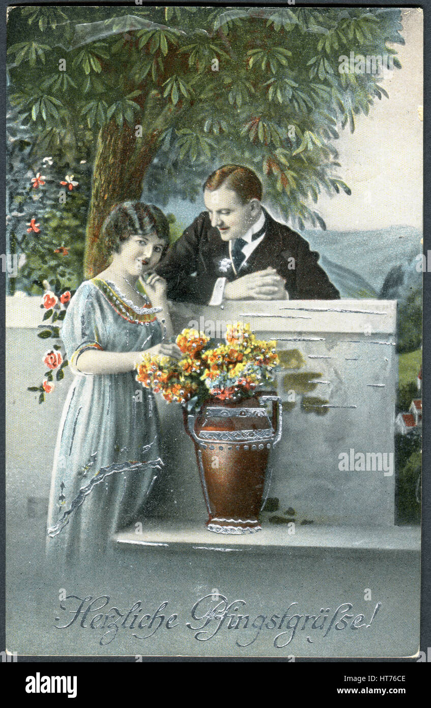 GERMANY - CIRCA 1919: A postcard printed in Germany, shows a couple in ...
