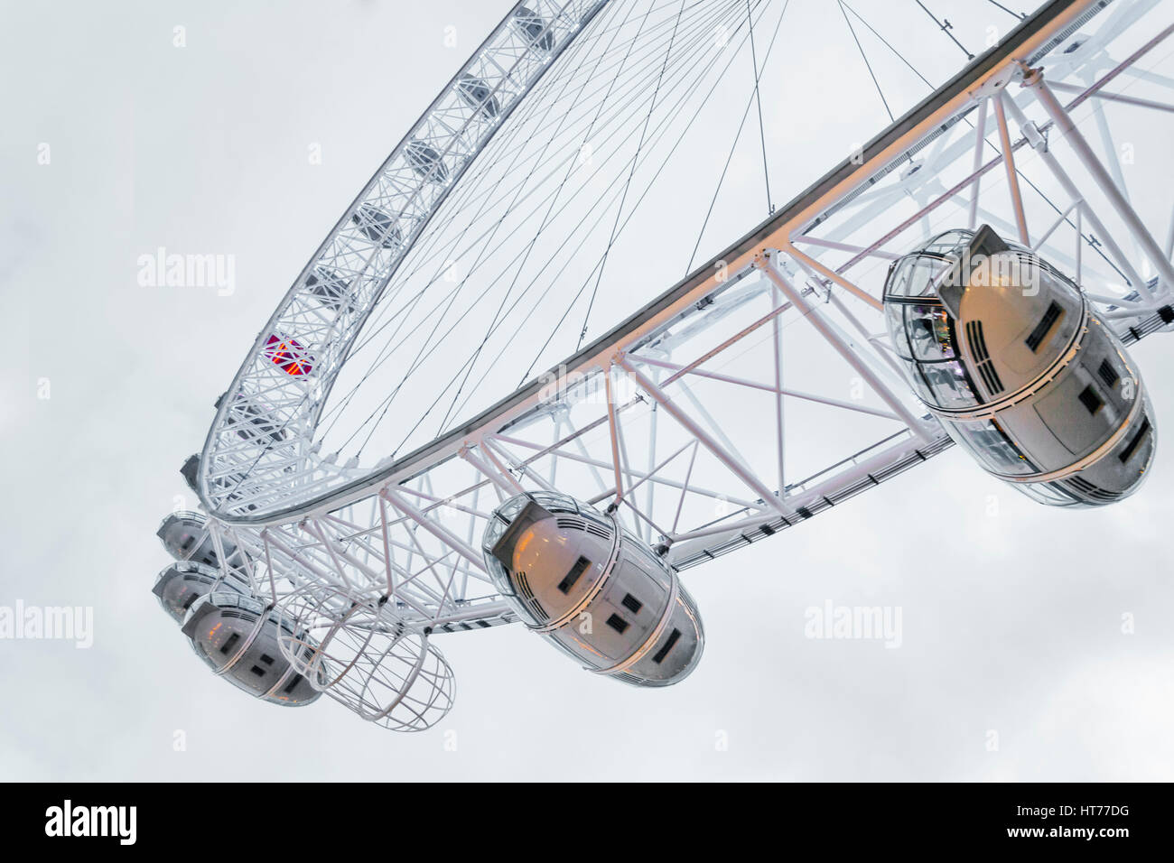 Tourists and travelers enjoying a ride on the London Eye in London ...