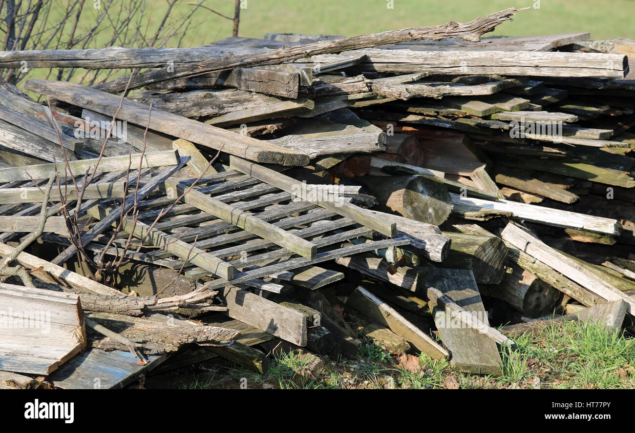 large woodshed with many pieces of wood and other wooden materials in a ...