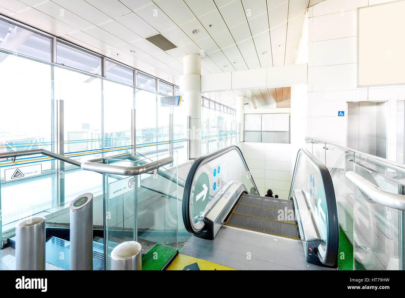 Escalator of the terminal building, modern interior of the building ...