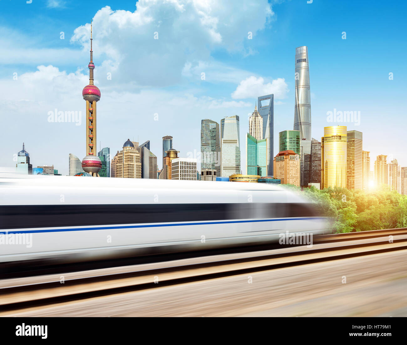 High-speed trains in the Shanghai Lujiazui City background Stock Photo ...